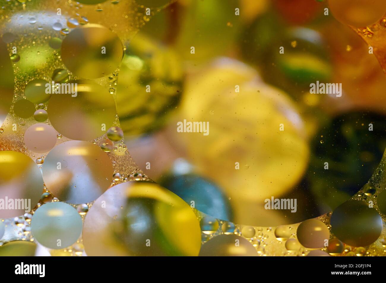 floating in the water abstract colorful oil drops Stock Photo - Alamy
