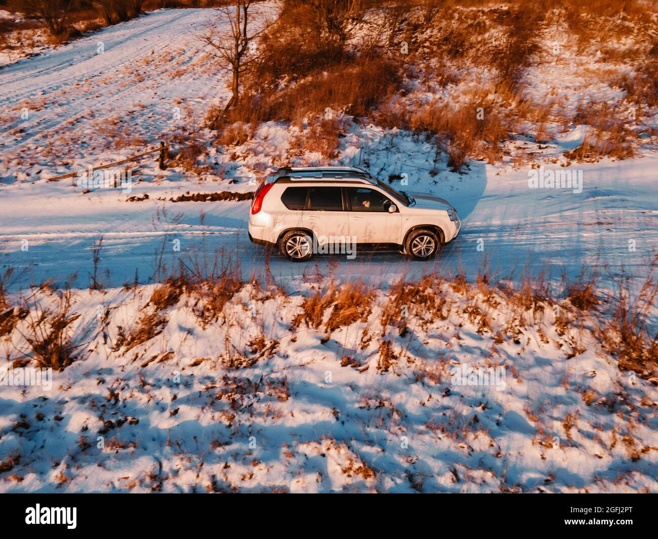 aerial view of suv car on trail road on sunset copy space Stock Photo ...