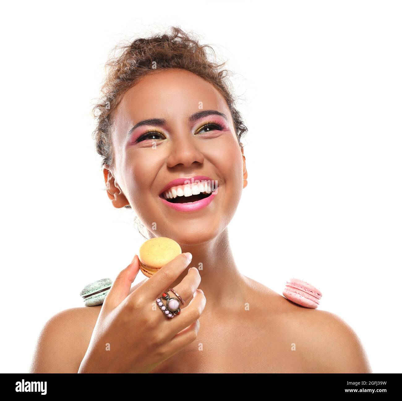 Girl eating biscuit african hi-res stock photography and images - Alamy