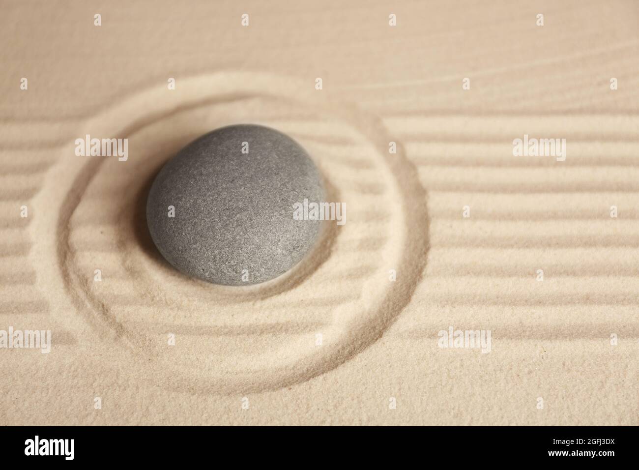 Japanese Zen garden. Pebble on a sand Stock Photo - Alamy