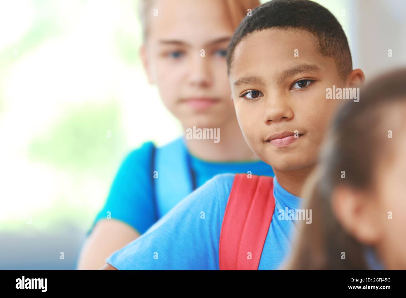 Cute kids in school Stock Photo - Alamy