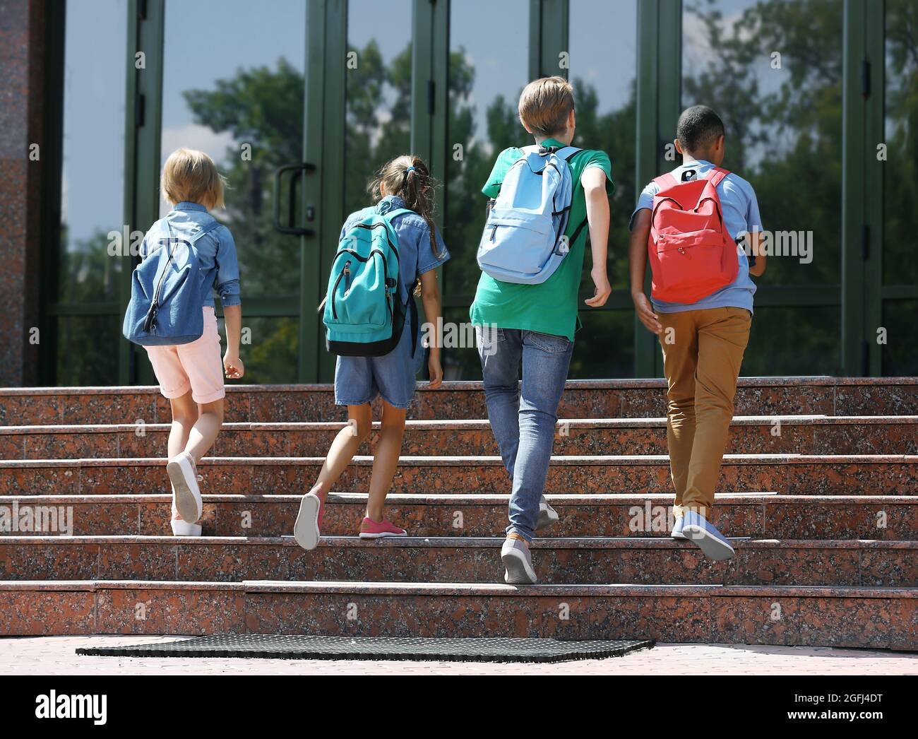 Cute kids going to school Stock Photo - Alamy