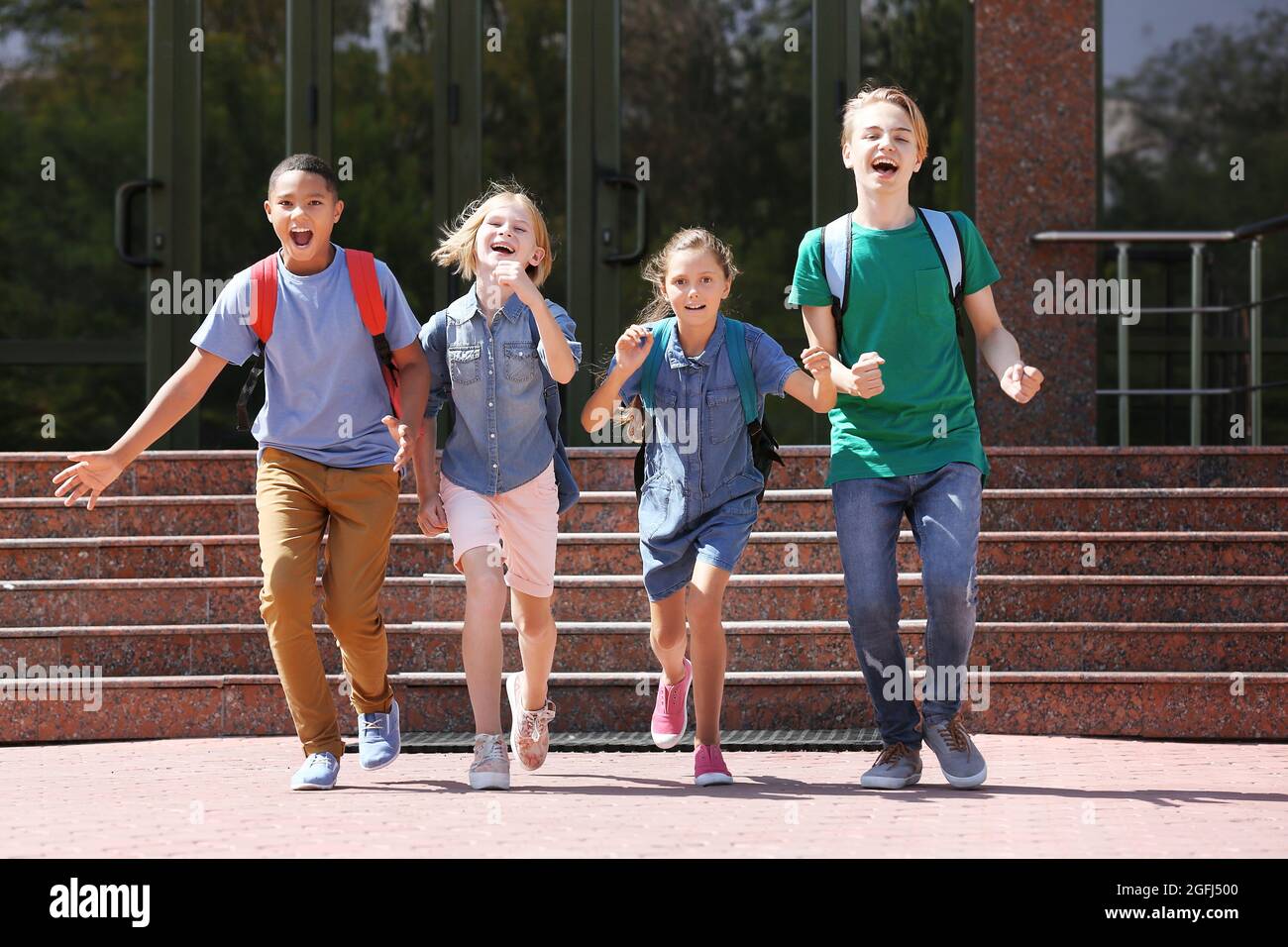 Kids Running Out Of School High Resolution Stock Photography and Images ...