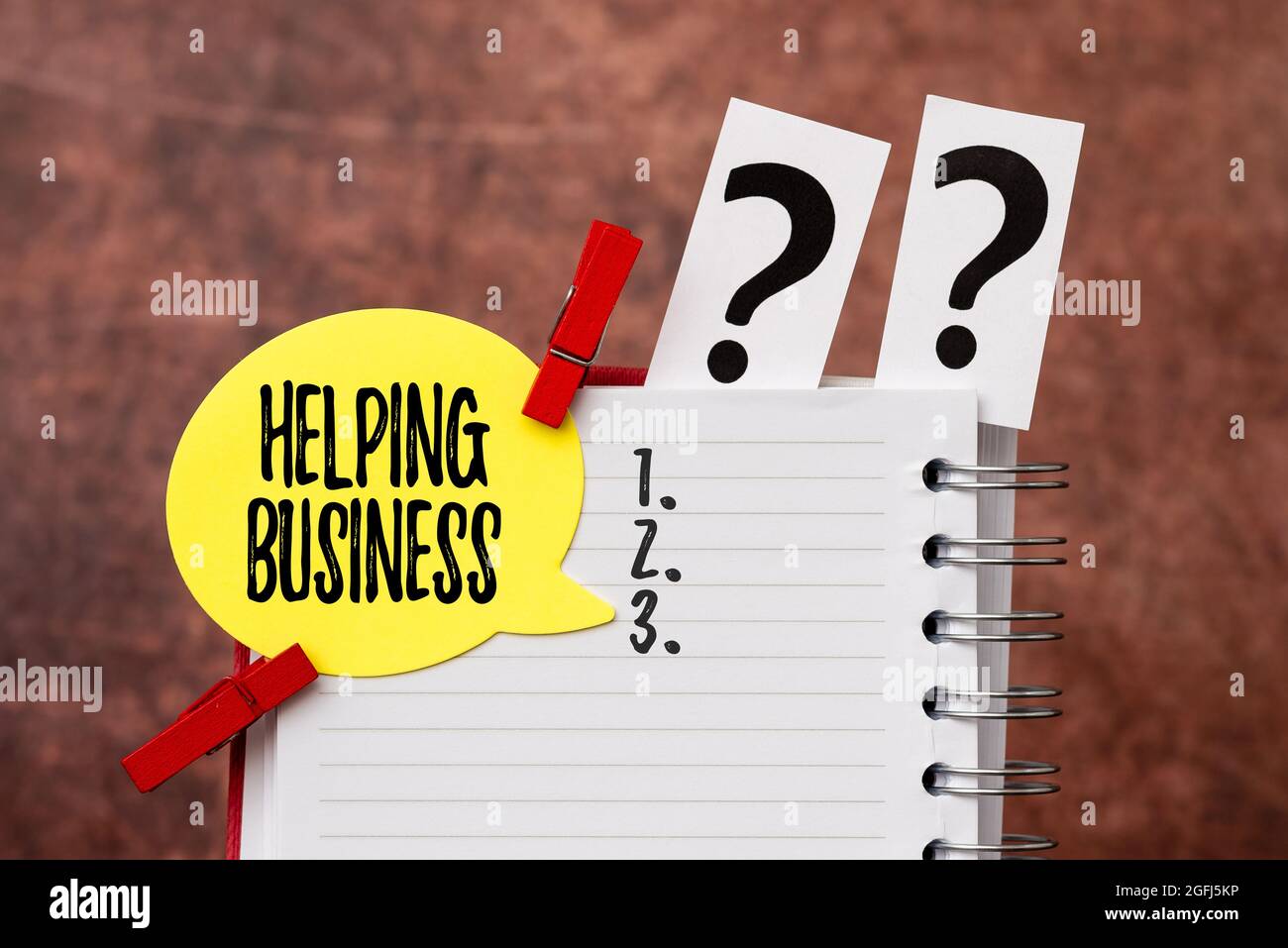 Hand writing sign Helping Business. Business idea improving some ...