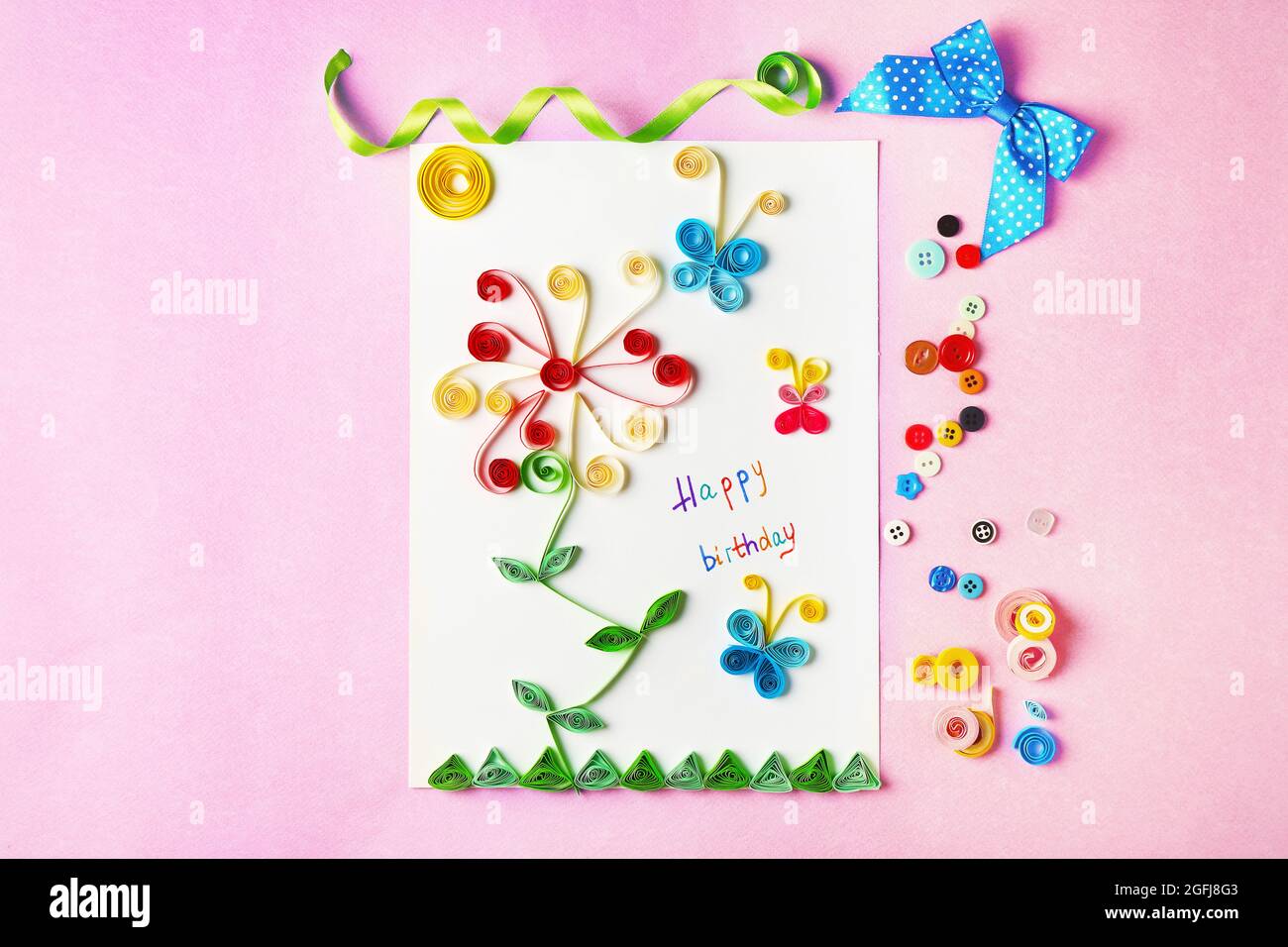 Handmade gift card and colorful buttons on violet background Stock ...