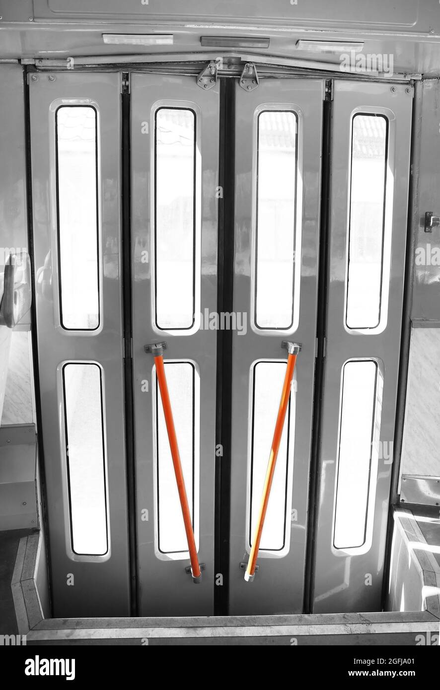 Closed entrance door in tram Stock Photo - Alamy