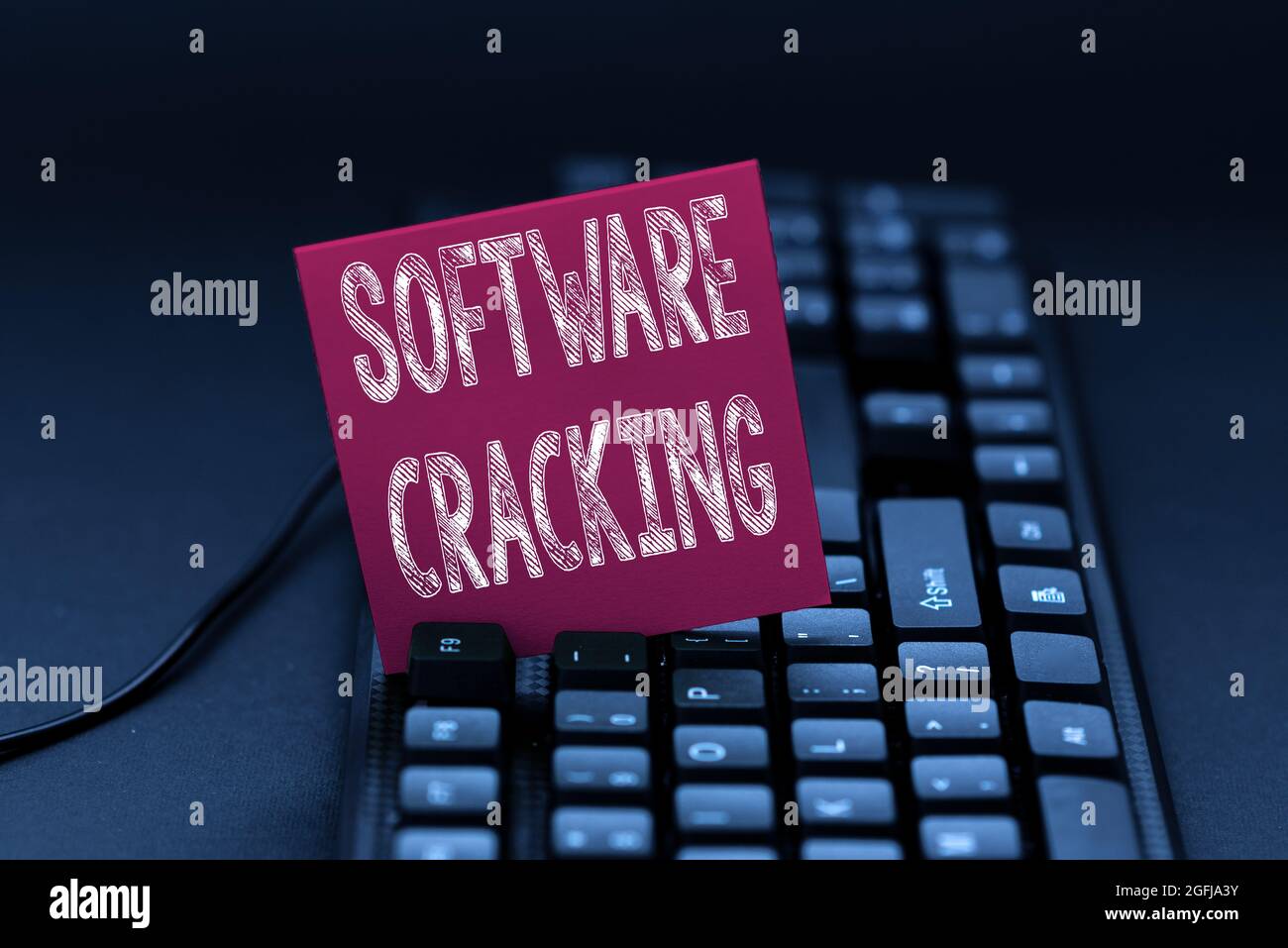 Hand writing sign Software Cracking. Word for modification of software ...