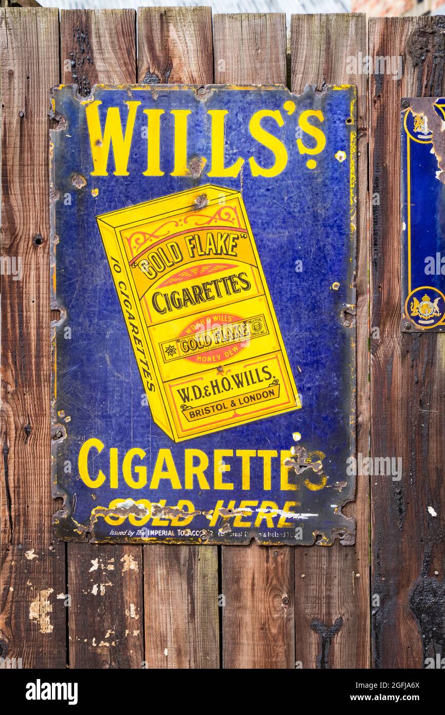old vintage enamelled sign for Wills cigarettes on wall at Beamish open ...