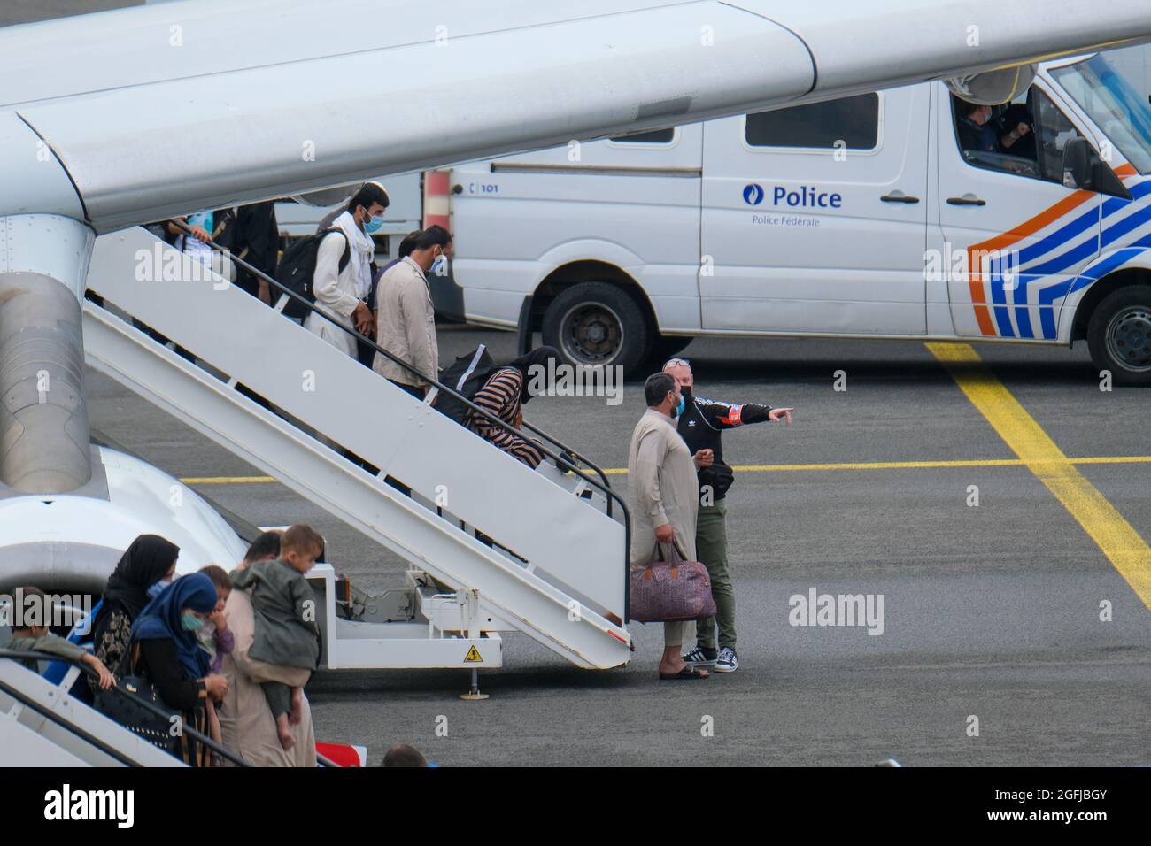 Illustration picture shows people getting out of the plane at the ...