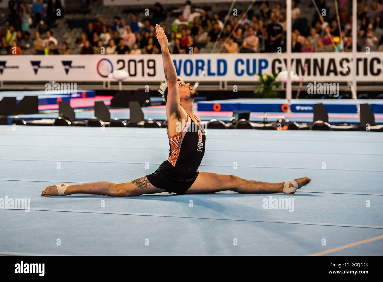 Casimir Schmidt from Netherlands, performs splits during the World Cup ...