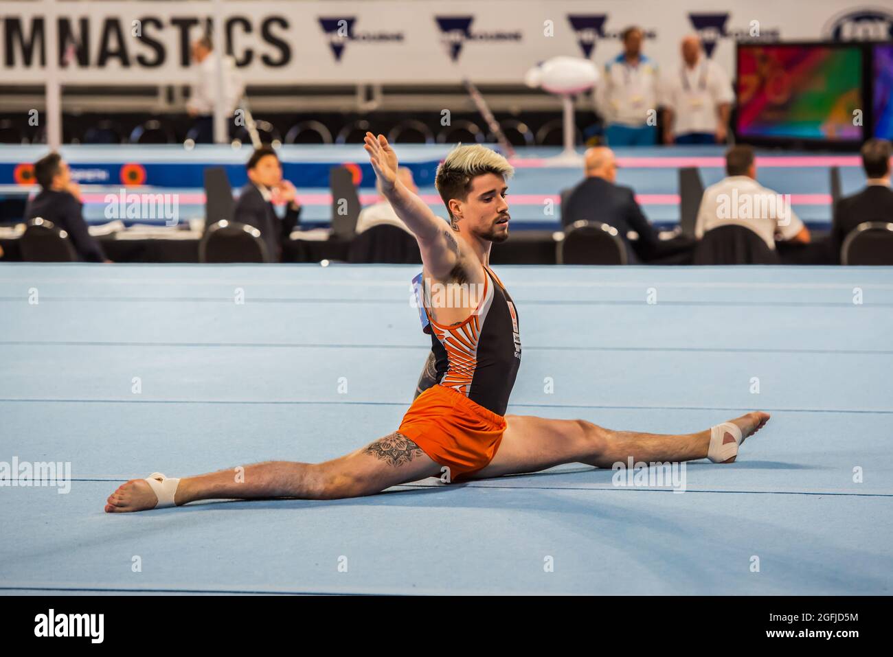 Casimir Schmidt from Netherlands in on splits during floor exercise at ...