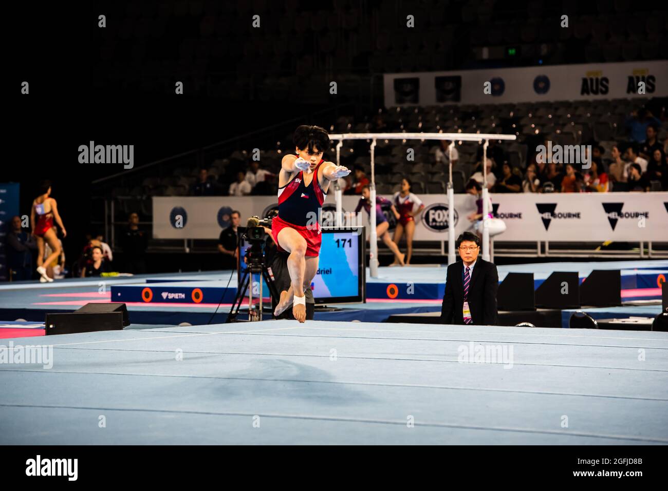 Carlos Edriel Yulo from Philippines is running to perform a salto ...
