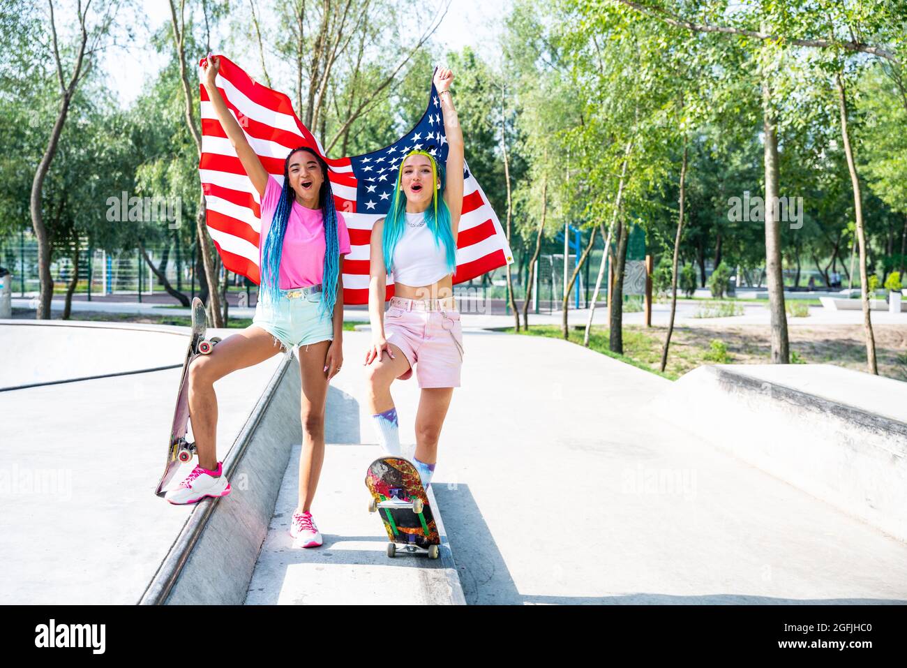 Group of skaters teens at the skatepark. Professional skateboarders ...