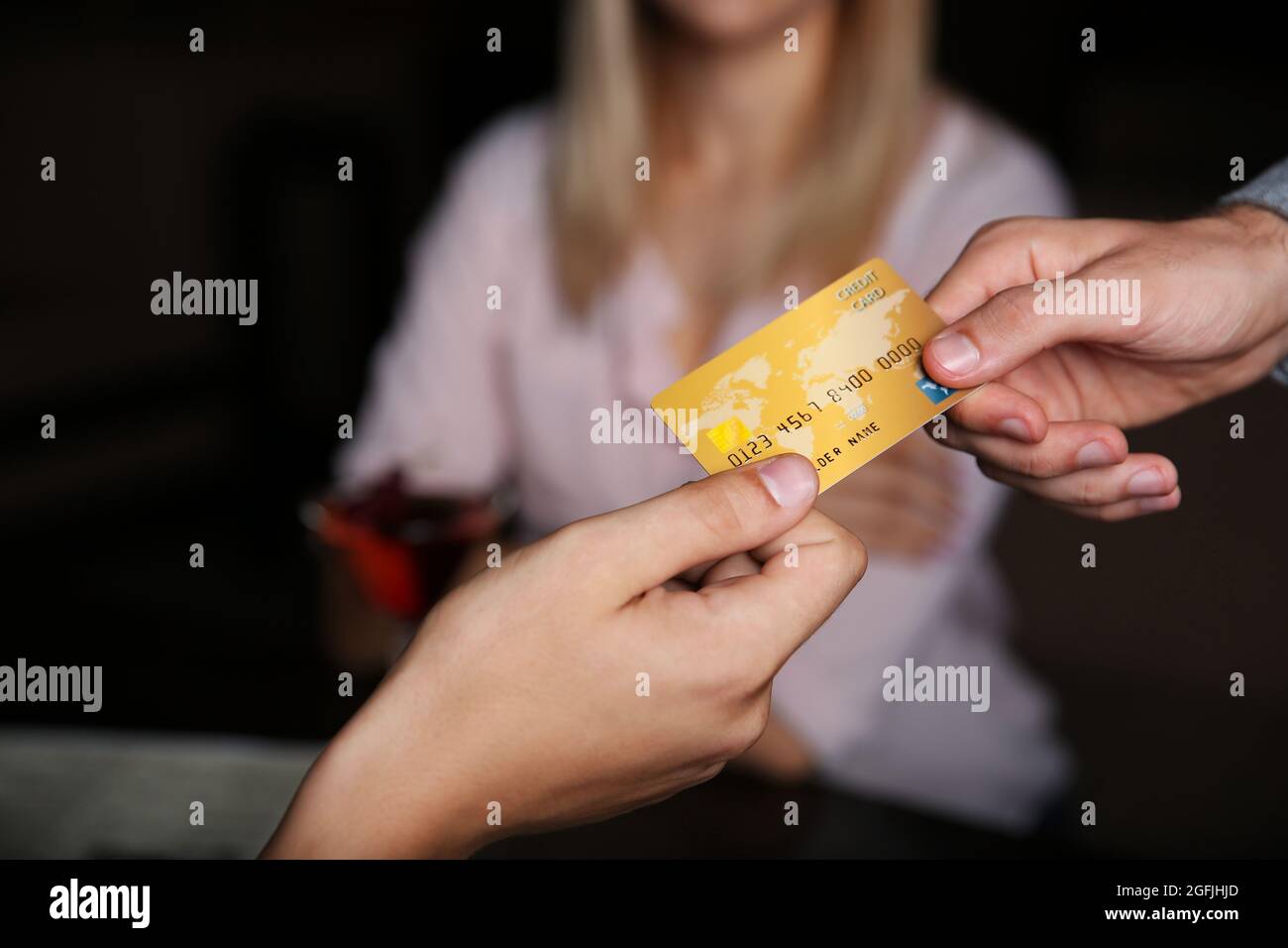Woman paying for drinks at bar card hi-res stock photography and images ...