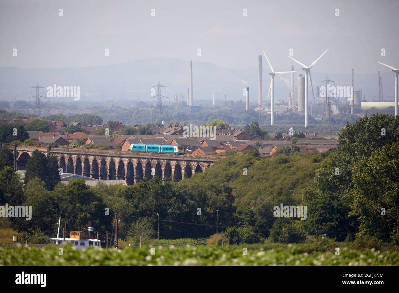 Train crosses Frodsham viaduct at Frodsham, Cheshire. And Frodsham Wind ...