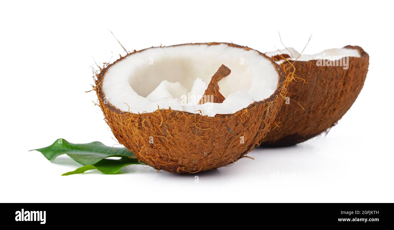 broken coconut on a white background close up Stock Photo - Alamy