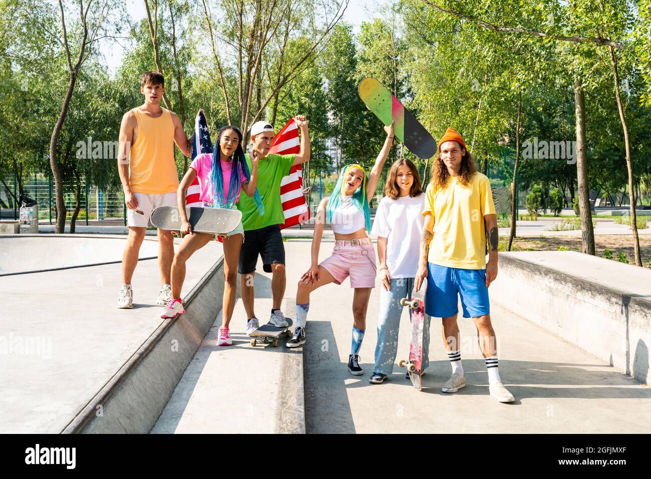 Group of skaters teens at the skatepark. Professional skateboarders ...