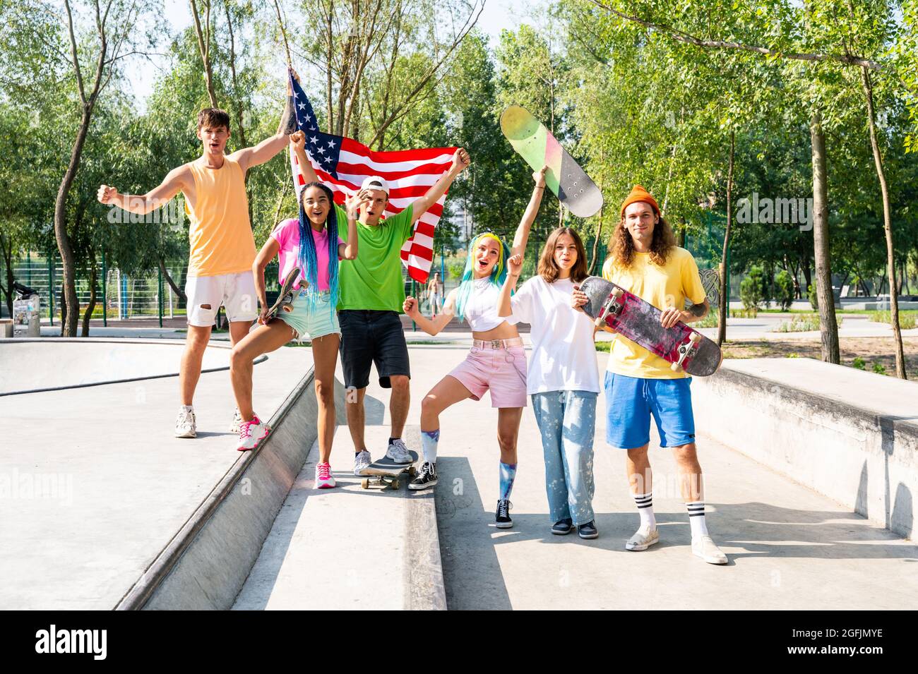 Group of skaters teens at the skatepark. Professional skateboarders ...