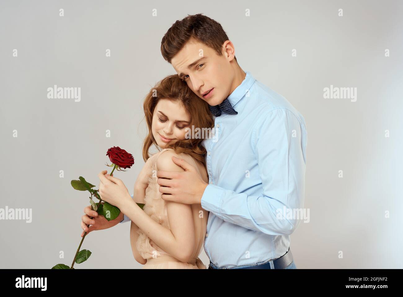 young couple charm gift rose flower romance Stock Photo - Alamy