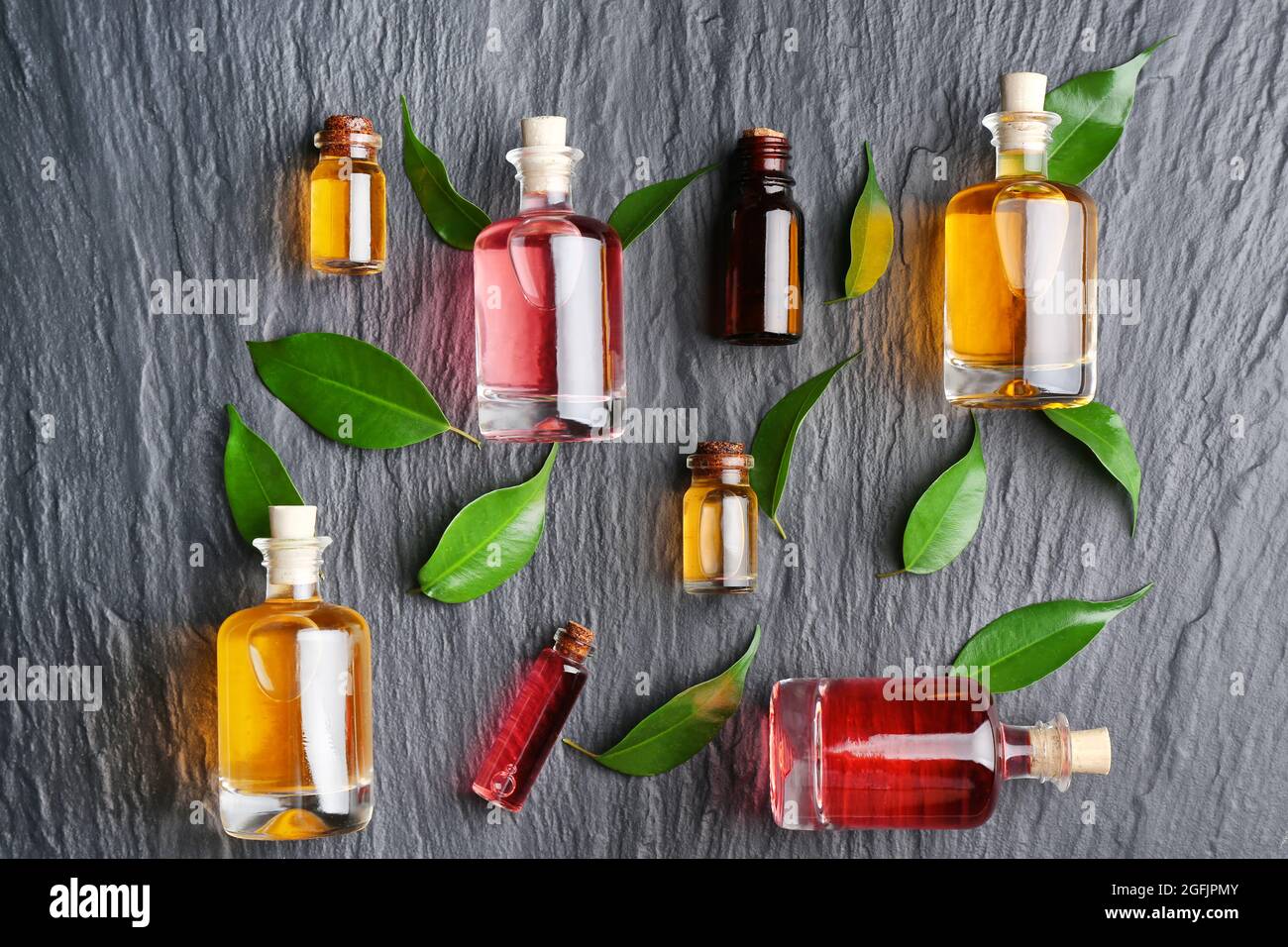 Aroma oil on dark background Stock Photo - Alamy