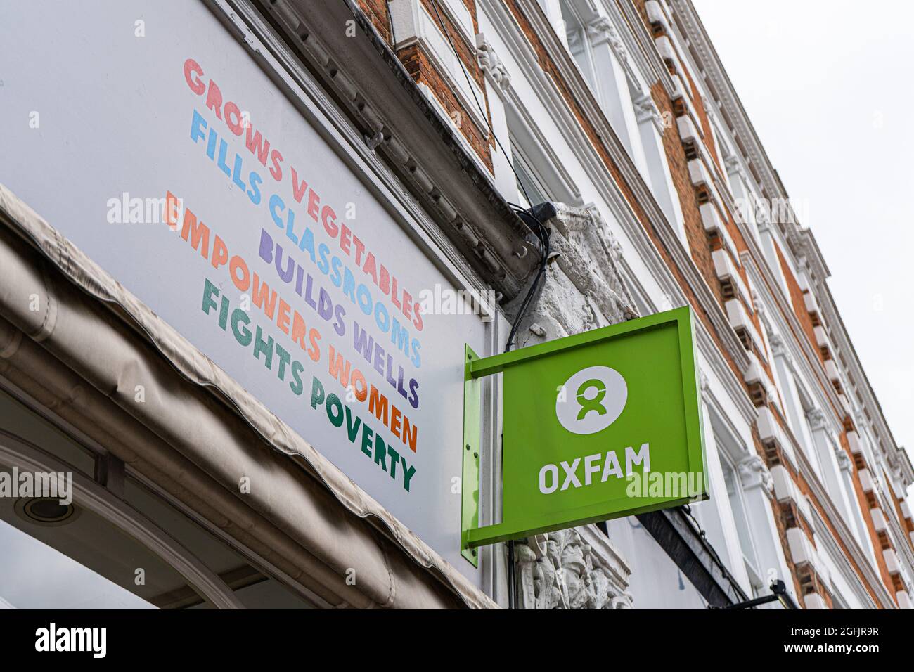 Oxfam charity shop signage in Wimbledon High Street Stock Photo - Alamy