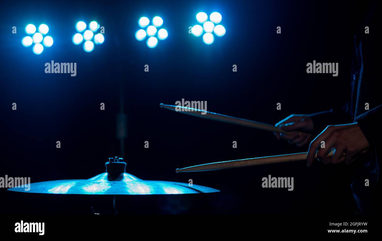 Close-up of drumsticks on a cymbal drum Stock Photo - Alamy