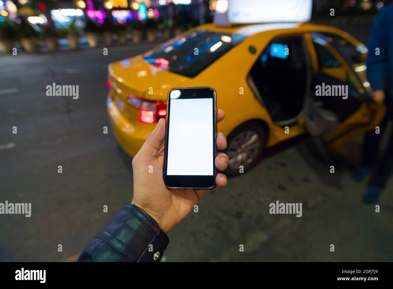 calling cab with the phone Stock Photo - Alamy
