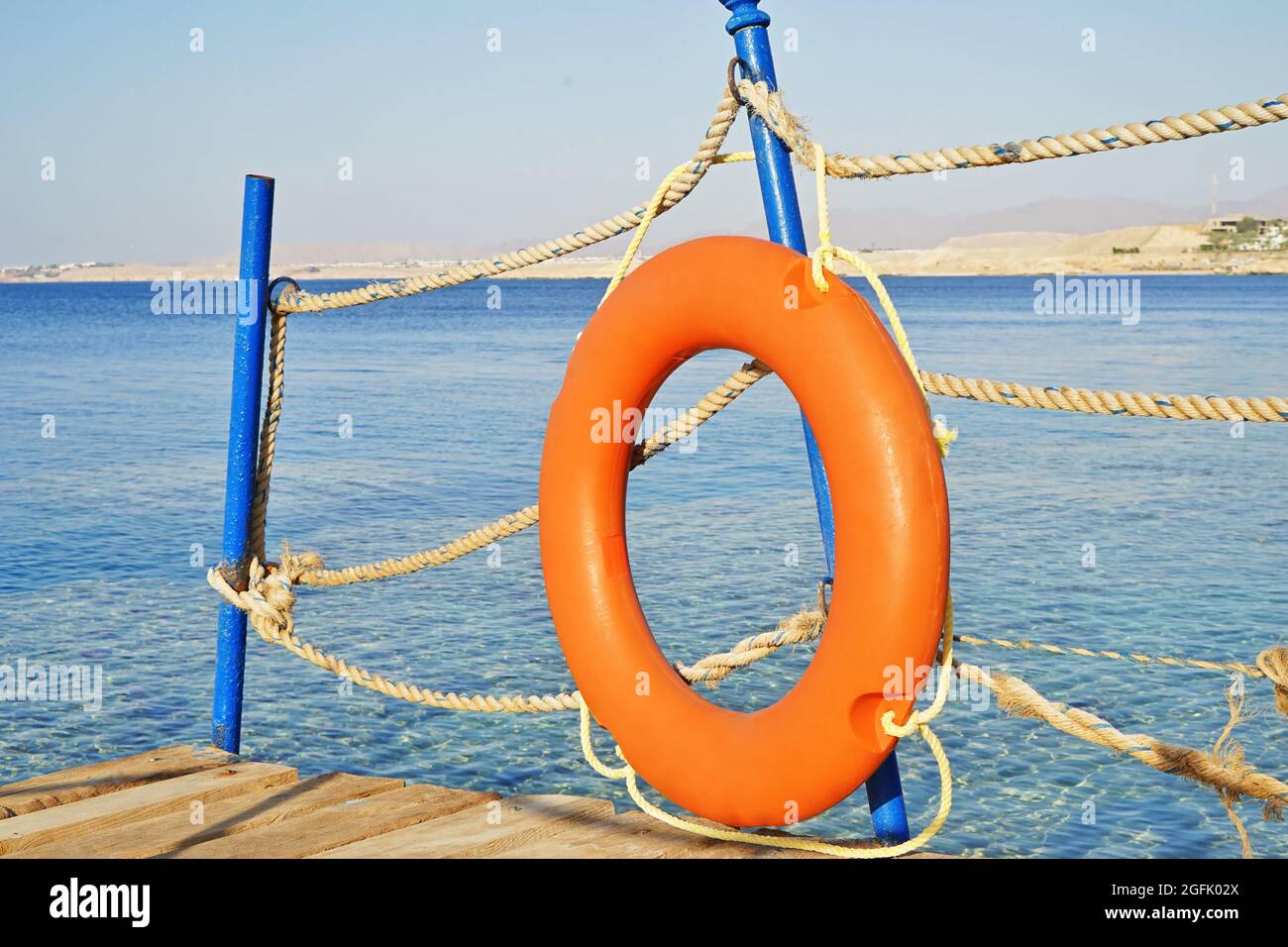 Lifebuoy on the sea pier Stock Photo - Alamy