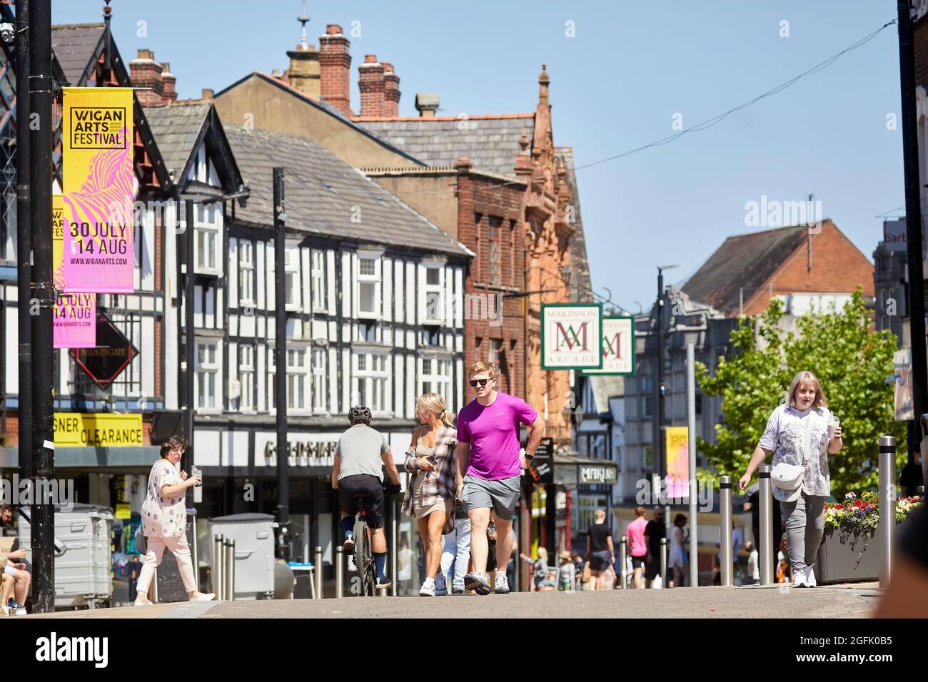 Wigan town centre, Lancashire, shops and shoppers along the ...