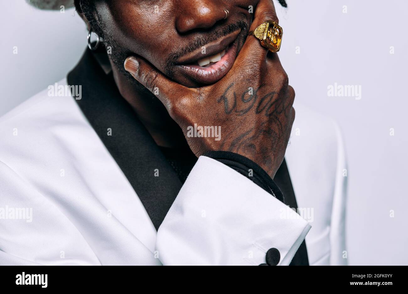 Portrait of an hip hop music musician. Cinematic image of a man wearing ...