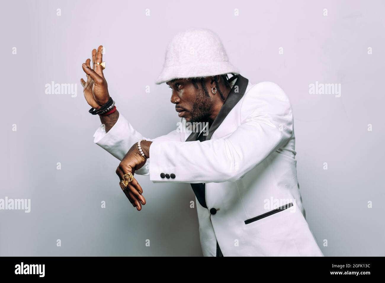 Portrait of an hip hop music musician. Cinematic image of a man wearing ...