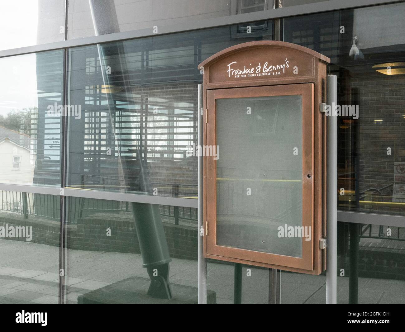 Empty Frankie & Benny's menu display board at closed branch of the ...