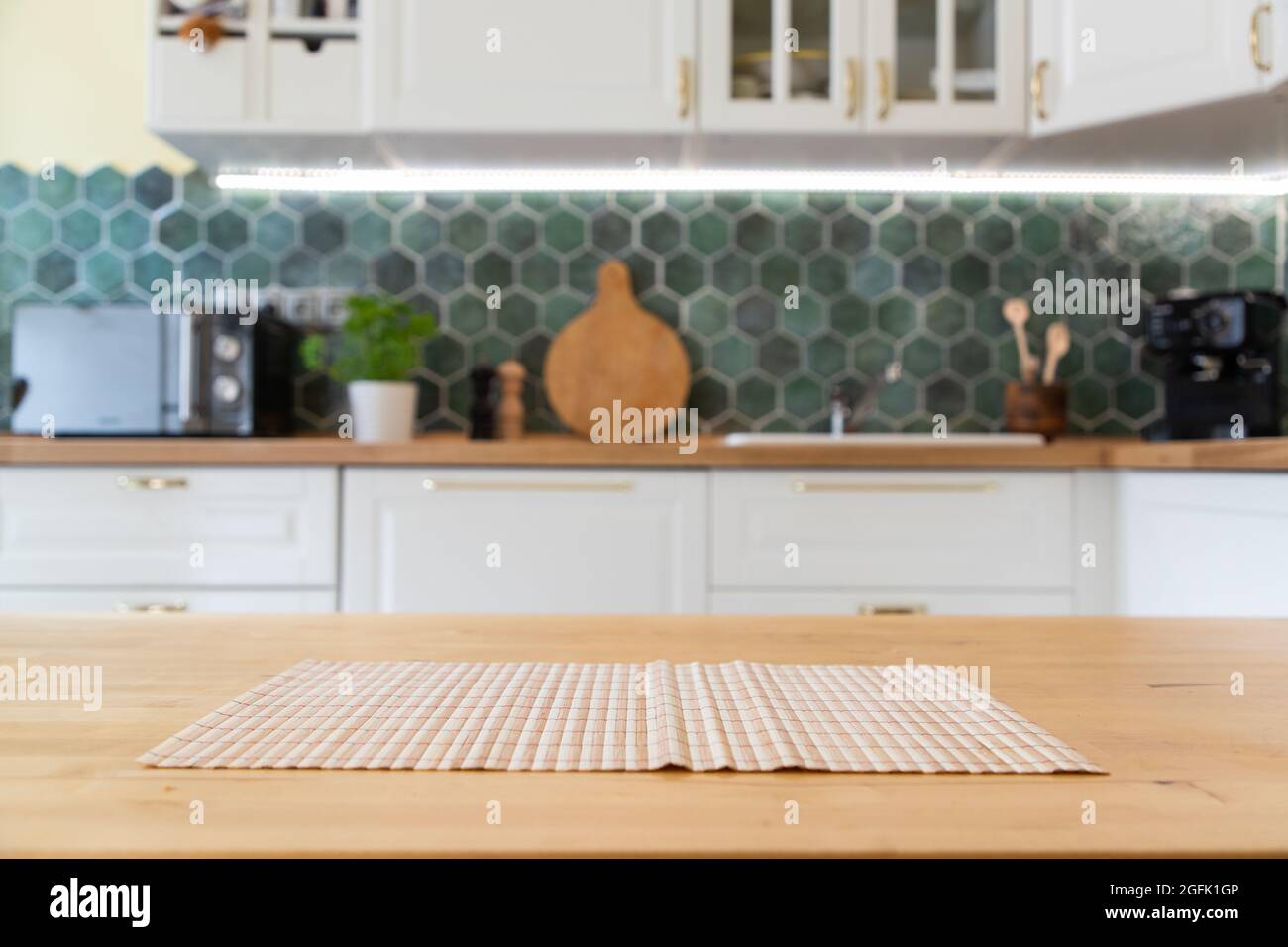 blurred kitchen interior and wooden desk space home background Stock ...