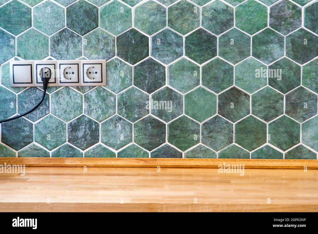 wooden kitchen tabletop and vintage green tile Stock Photo - Alamy