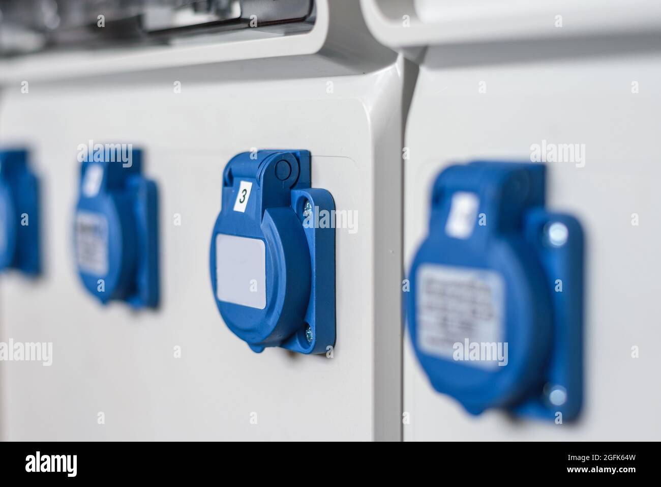 Industrial sockets on distribution board. Construction site electricity, temporary energy supply ...