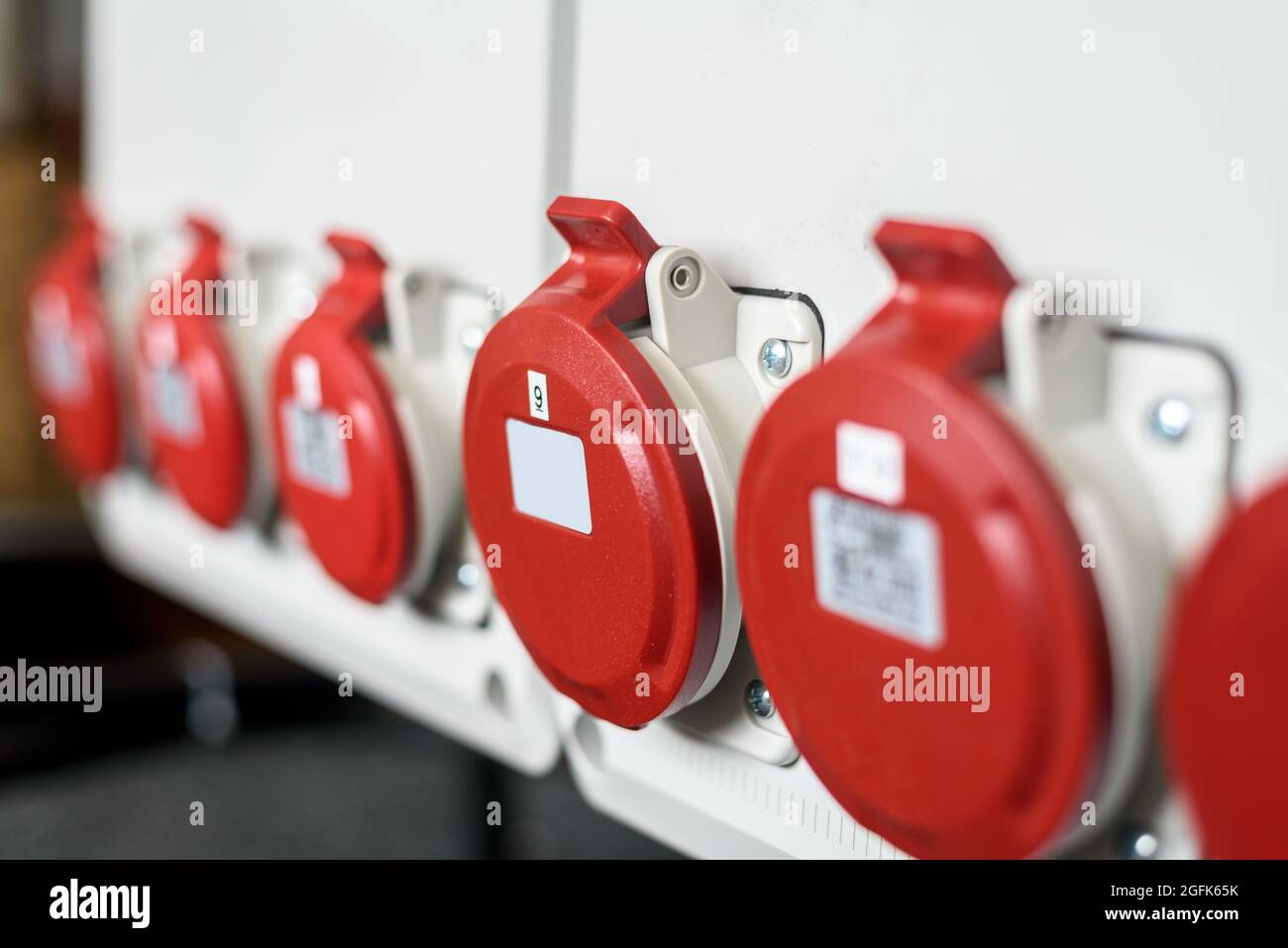 Industrial sockets on distribution board. Construction site electricity, temporary energy supply ...