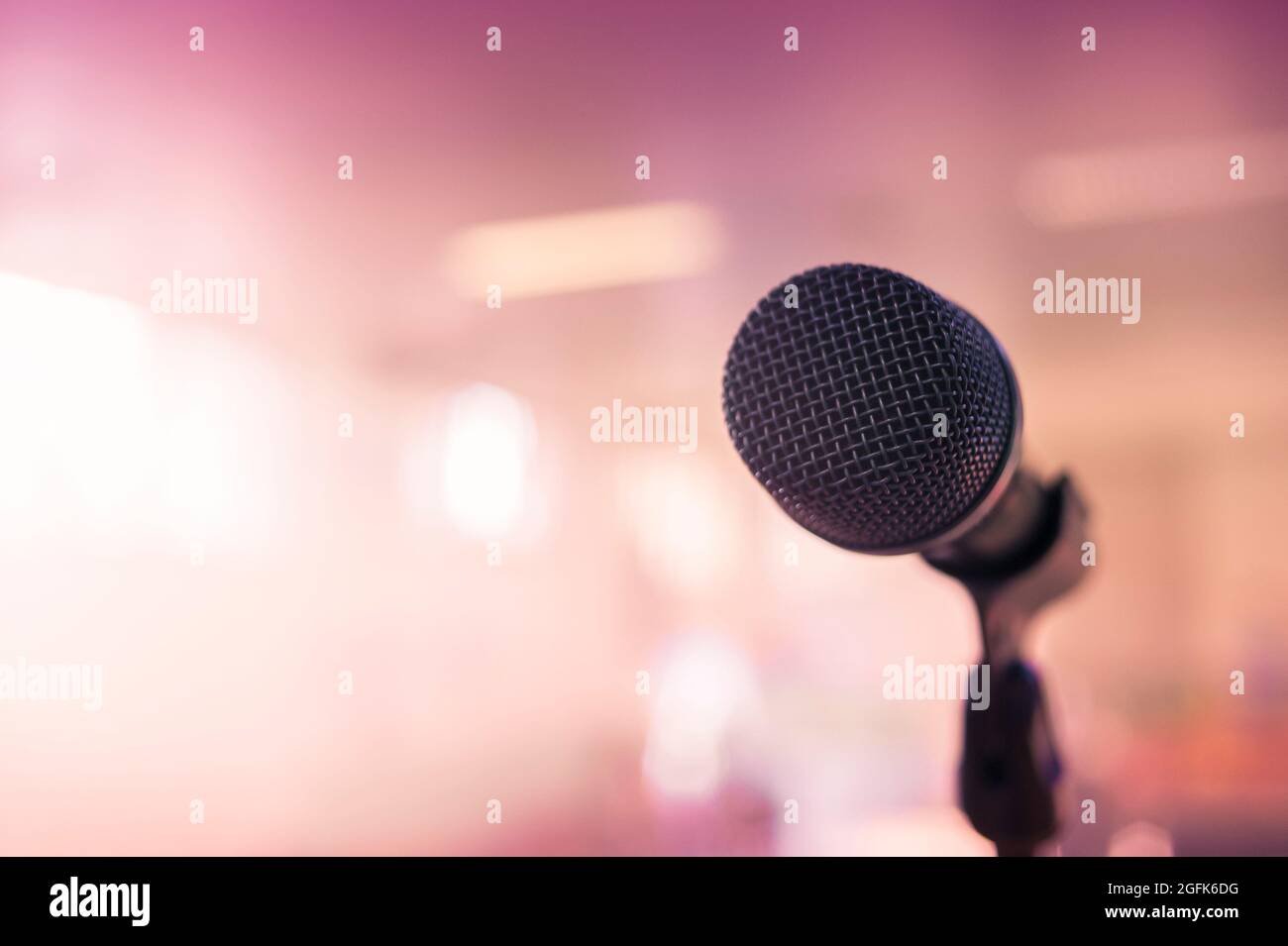Microphone on stage Stock Photo - Alamy