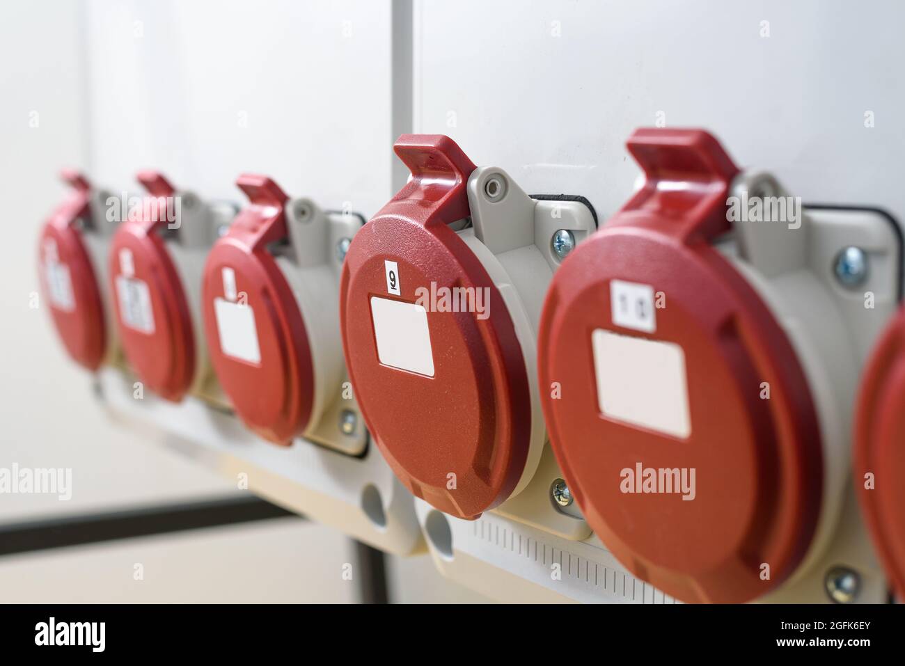 Industrial sockets on distribution board. Construction site electricity, temporary energy supply ...