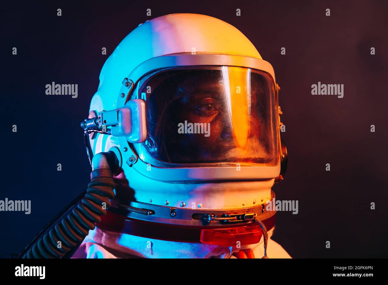 Cinematic image of an astronaut. Colorful portrait of a man with ...