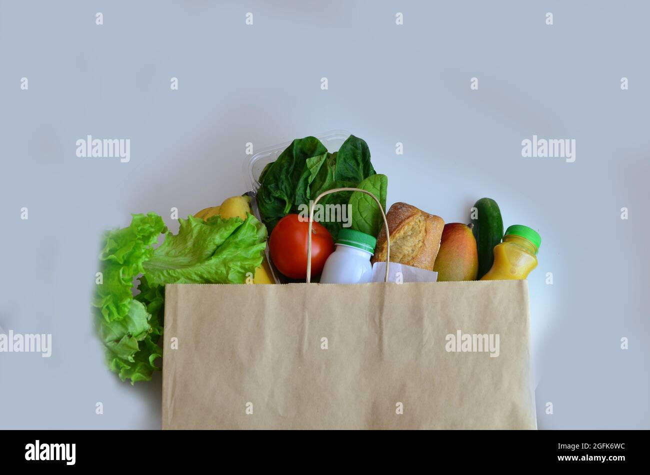 Healthy food in package of different fruits and vegetables, top view ...