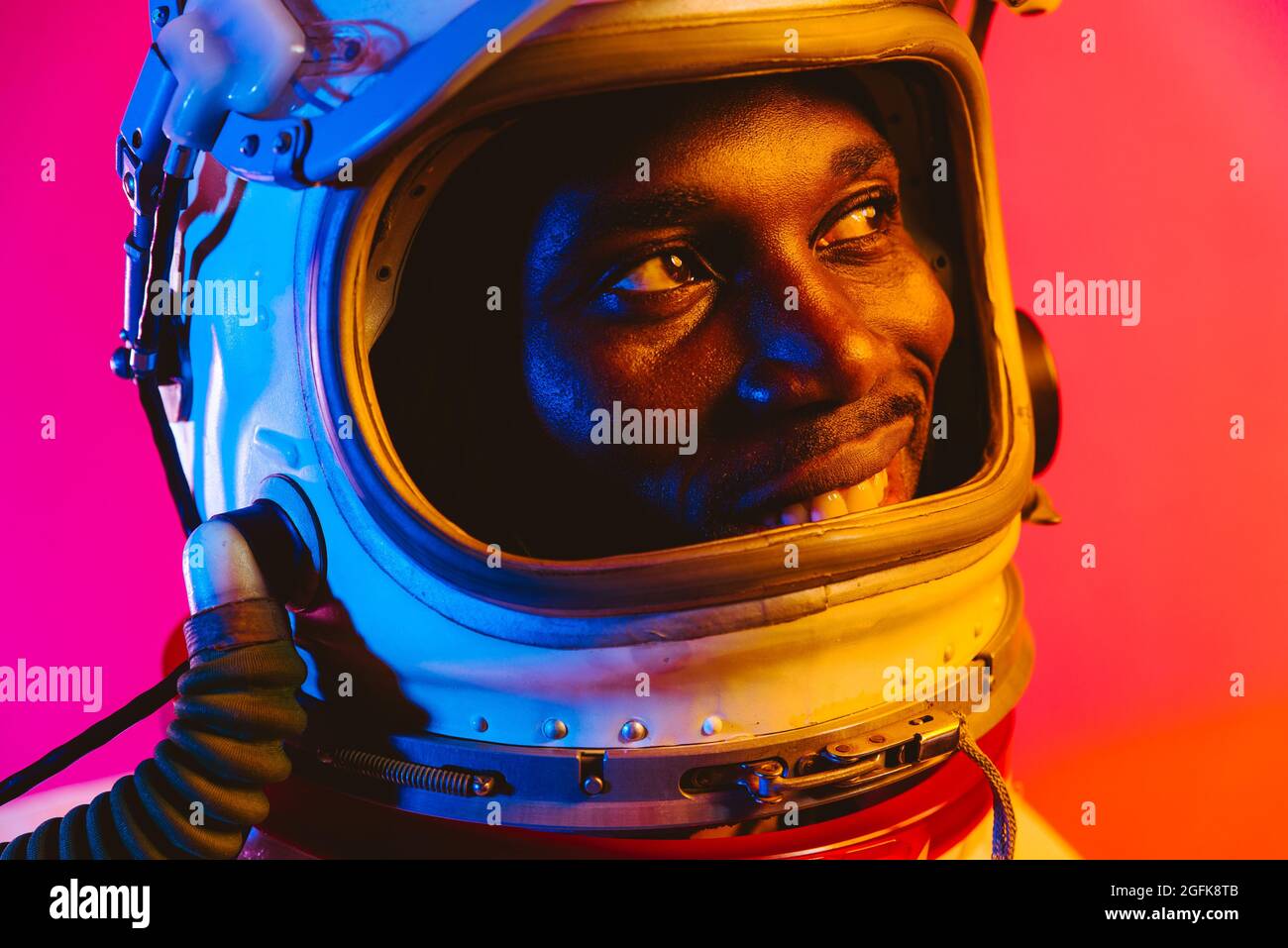 Cinematic image of an astronaut. Colorful portrait of a man with ...