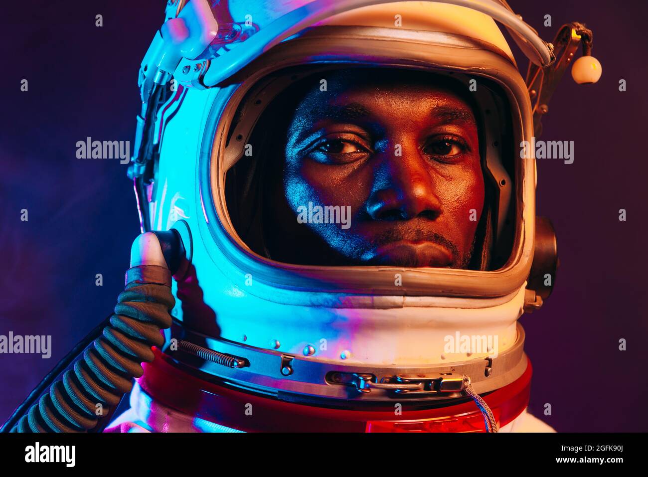 Cinematic image of an astronaut. Colorful portrait of a man with ...