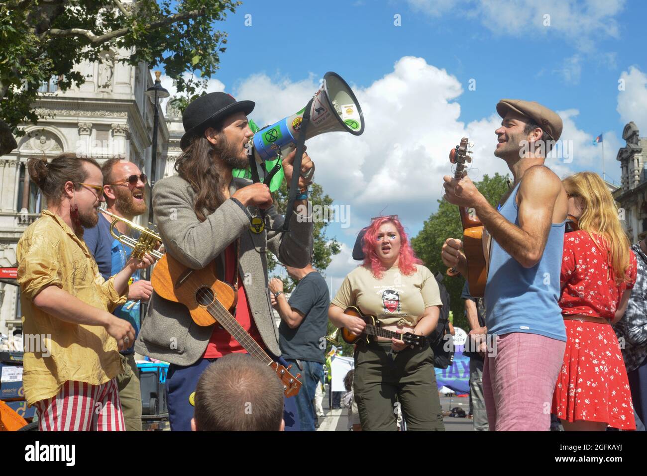 An activist speaking on a megaphone, during the demonstration. Climate ...