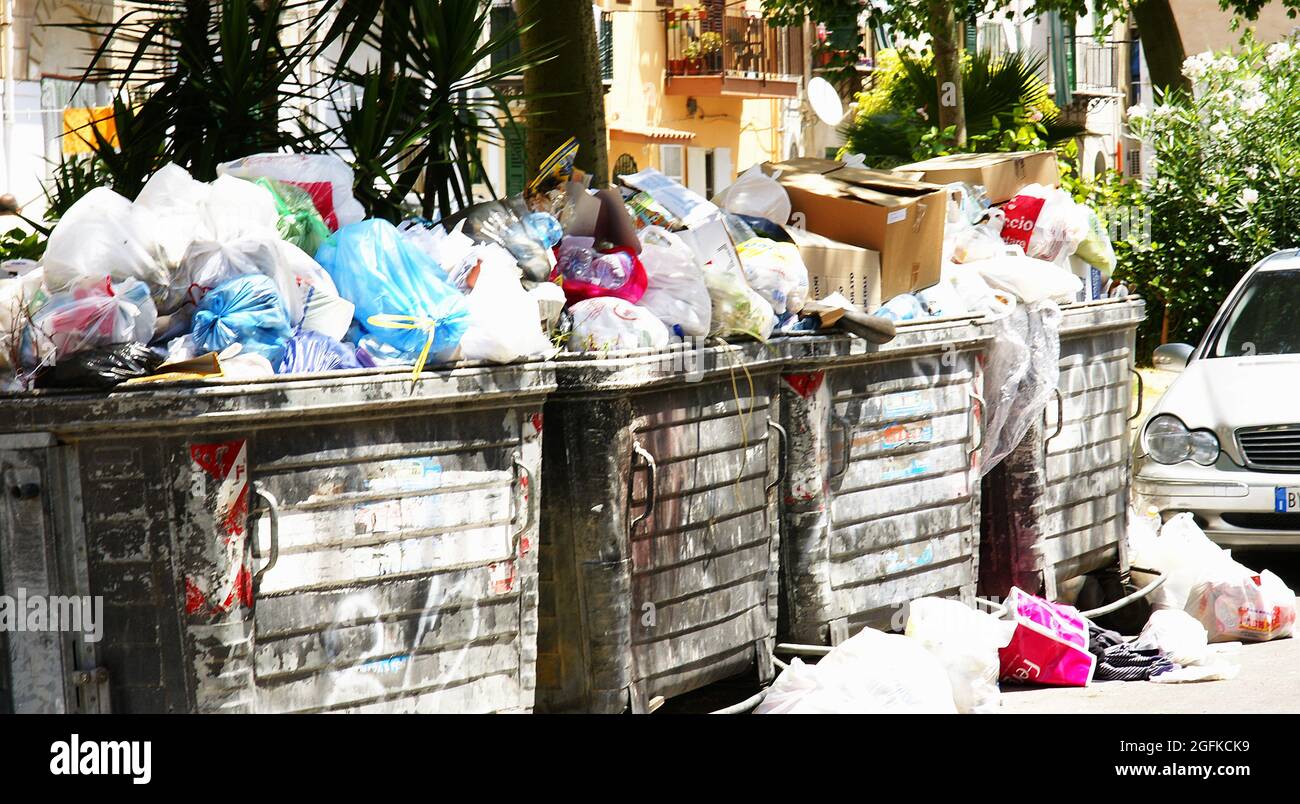 Garbage containers on a street in Palermo, Italy, Europe Stock Photo ...