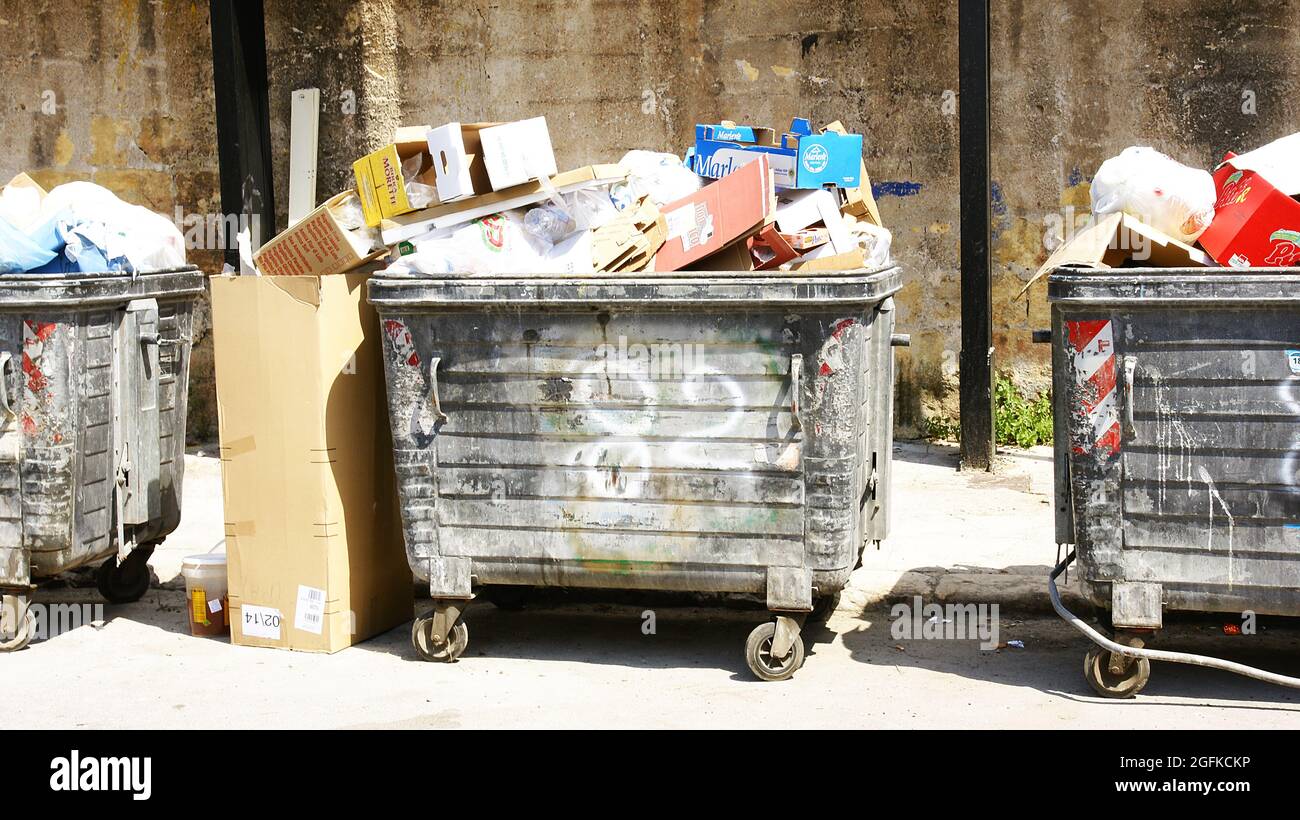 Garbage containers on a street in Palermo, Italy, Europe Stock Photo ...
