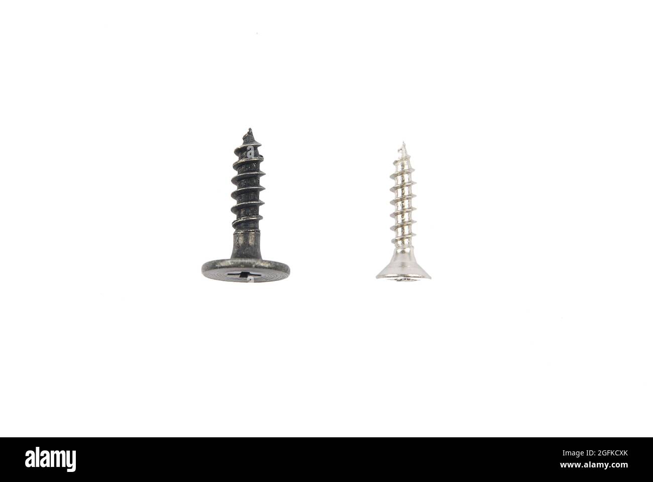 Used screws on white background Stock Photo - Alamy