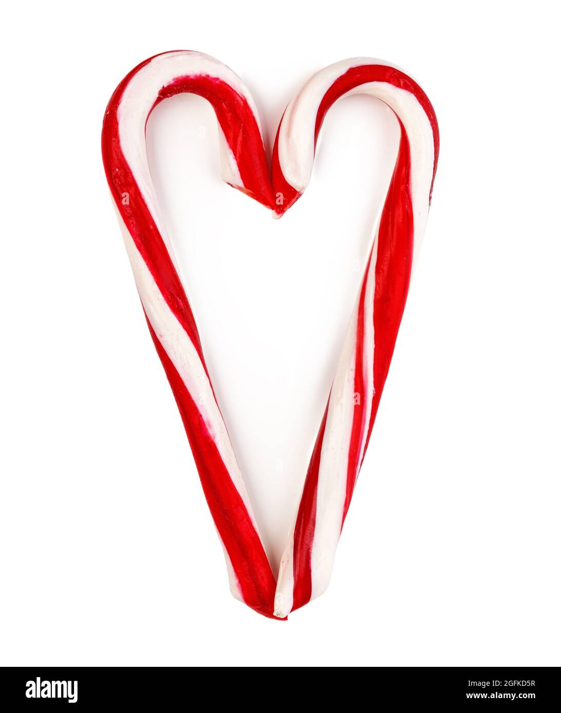 Two candy canes isolated on white background Stock Photo - Alamy