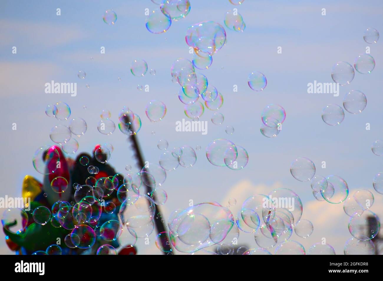 Many colorful bubbles and balloons on a fair Stock Photo - Alamy