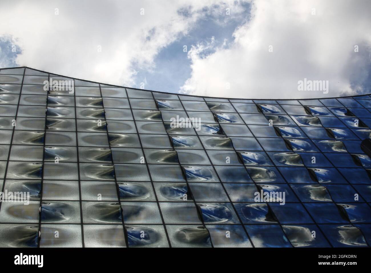 Curved glass facade of a modern building Stock Photo - Alamy