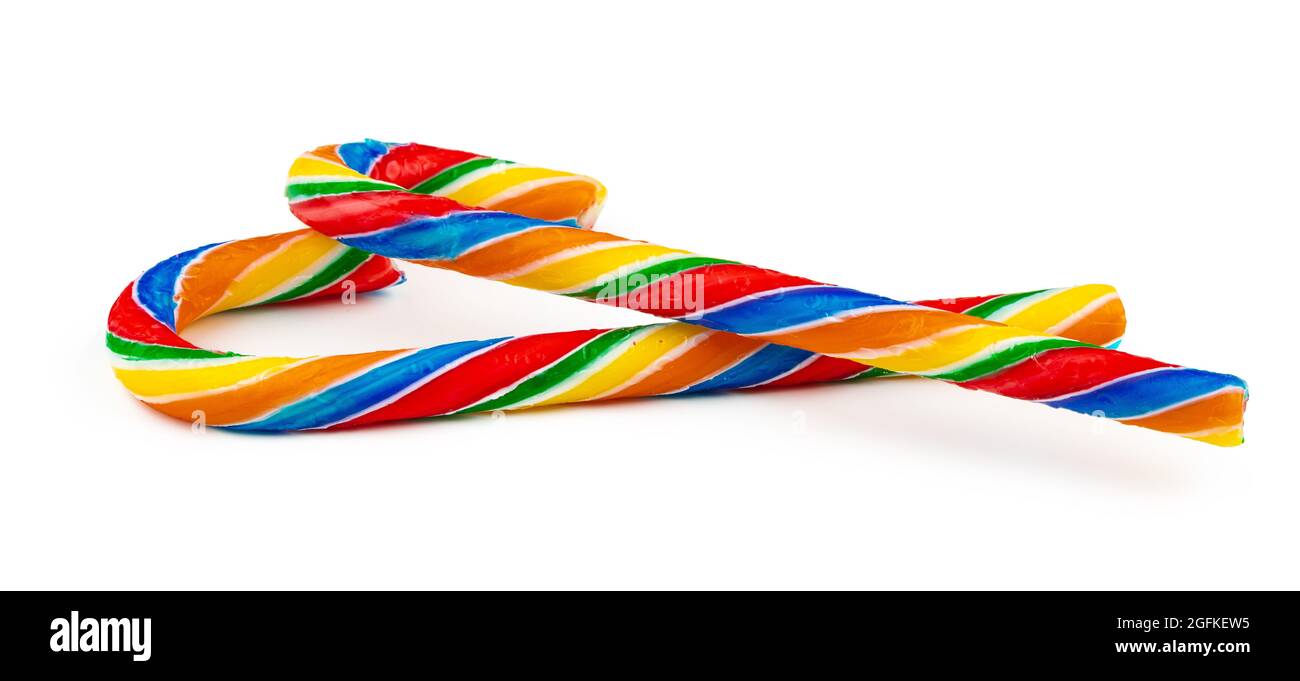 Rainbow colored candy cane isolated on white background Stock Photo - Alamy
